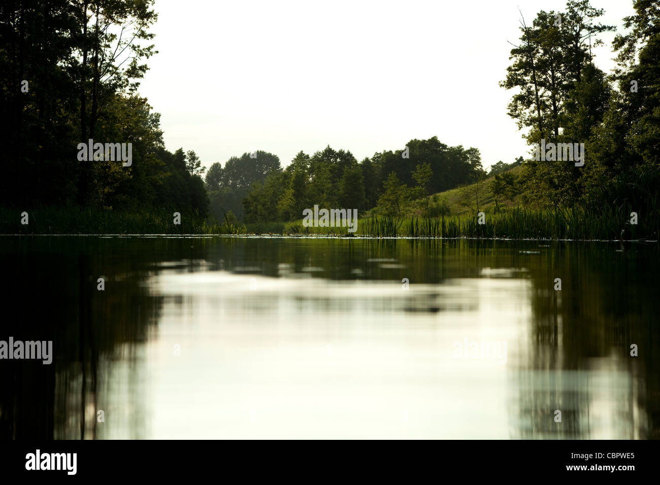 Masuria scenery summer with calmly flow water Stock Photo - Alamy