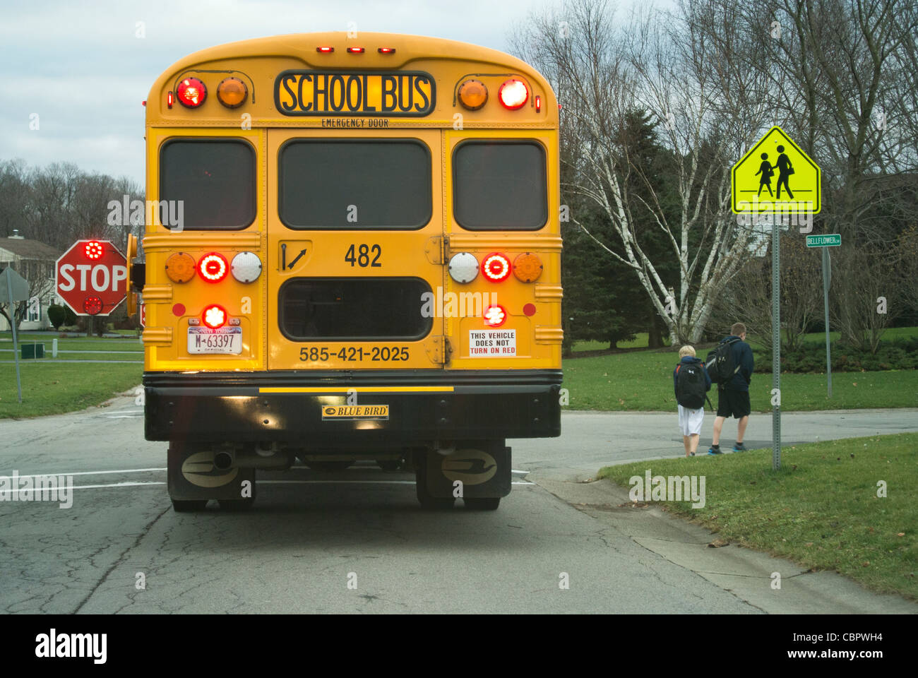 Children getting off schoolbus Stock Photo - Alamy