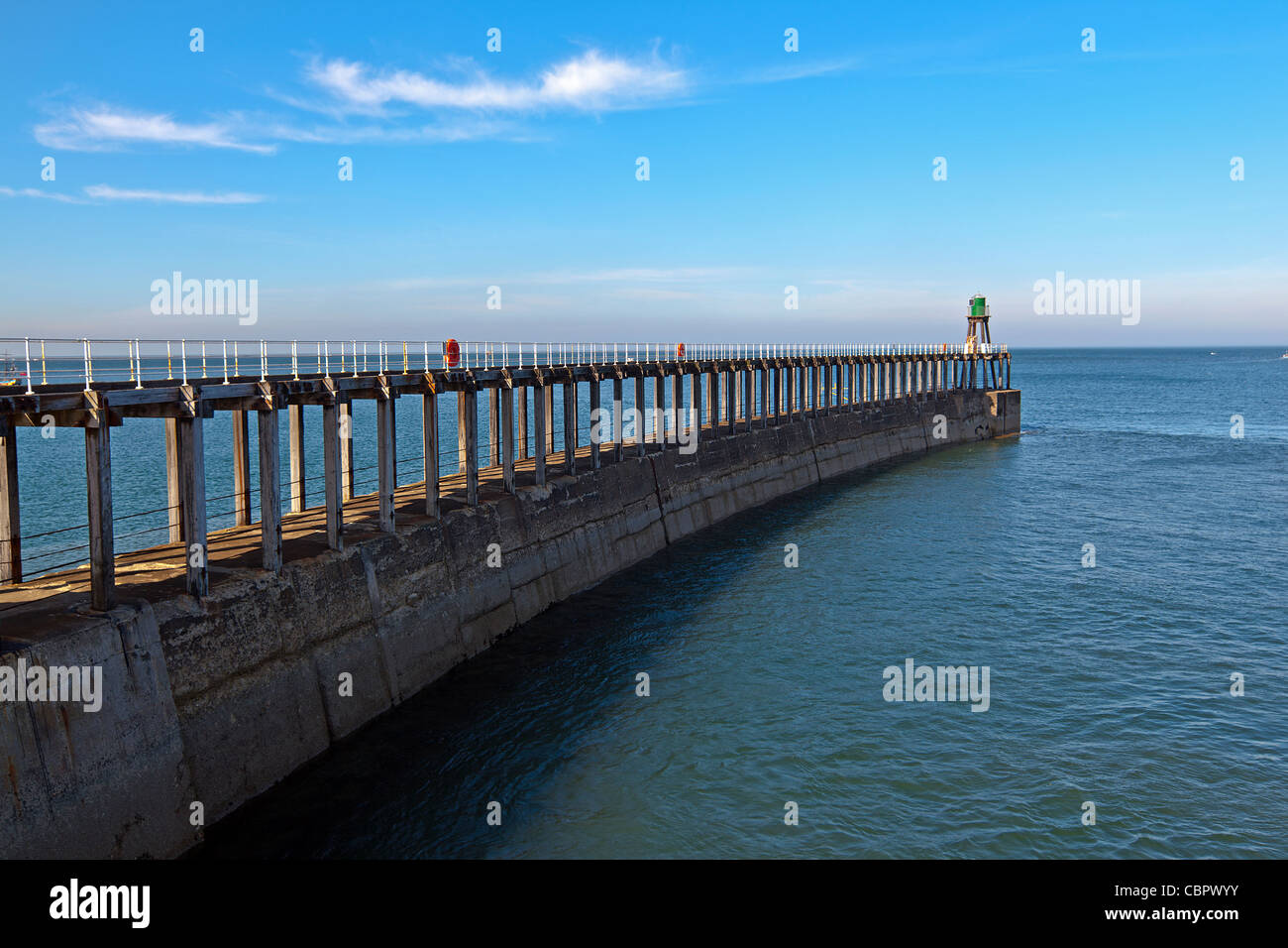 The West Pier entrance to Whitby Harbour Stock Photo - Alamy