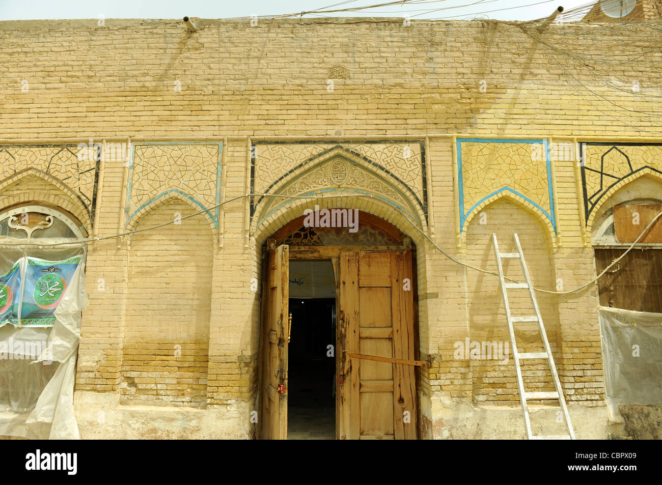 The mosque entrance to a traditional tea (chai) house with a 500 year ...