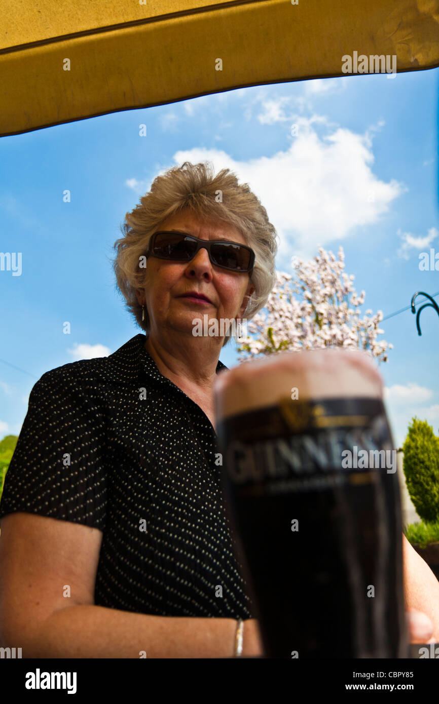 Woman guinness hi-res stock photography and images - Alamy