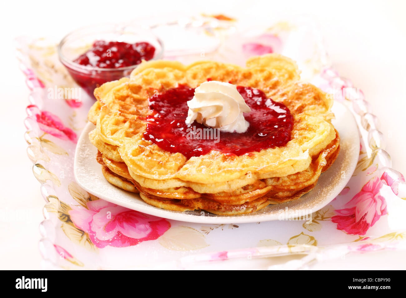 Waffles with fresh strawberry jam and whipped cream Stock Photo - Alamy