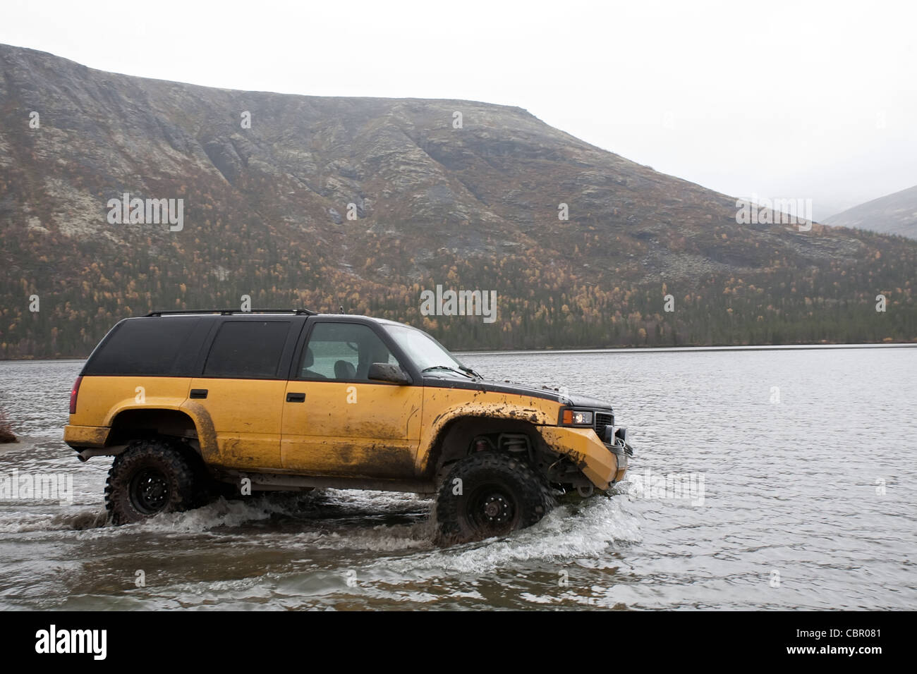 big four-wheel jeep crossing a river Stock Photo - Alamy