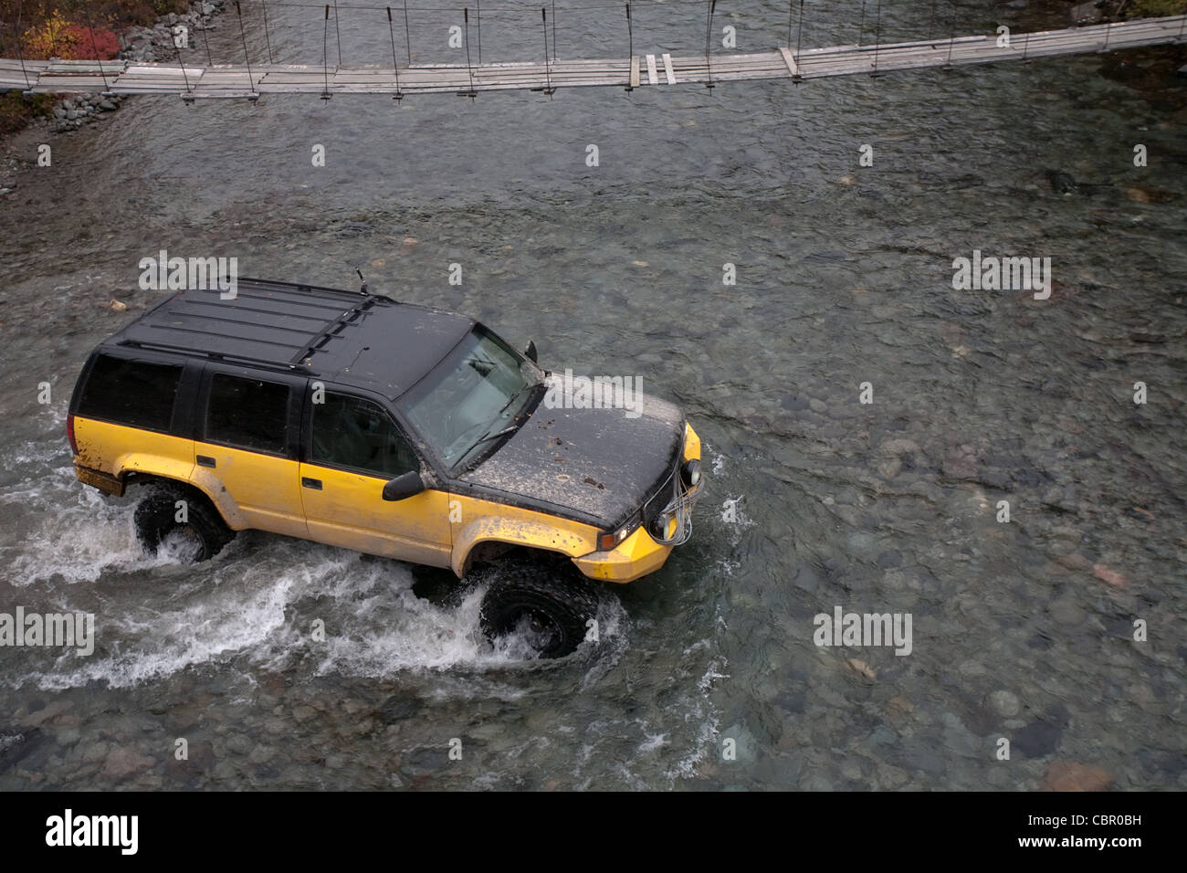 big four-wheel jeep crossing a river Stock Photo - Alamy