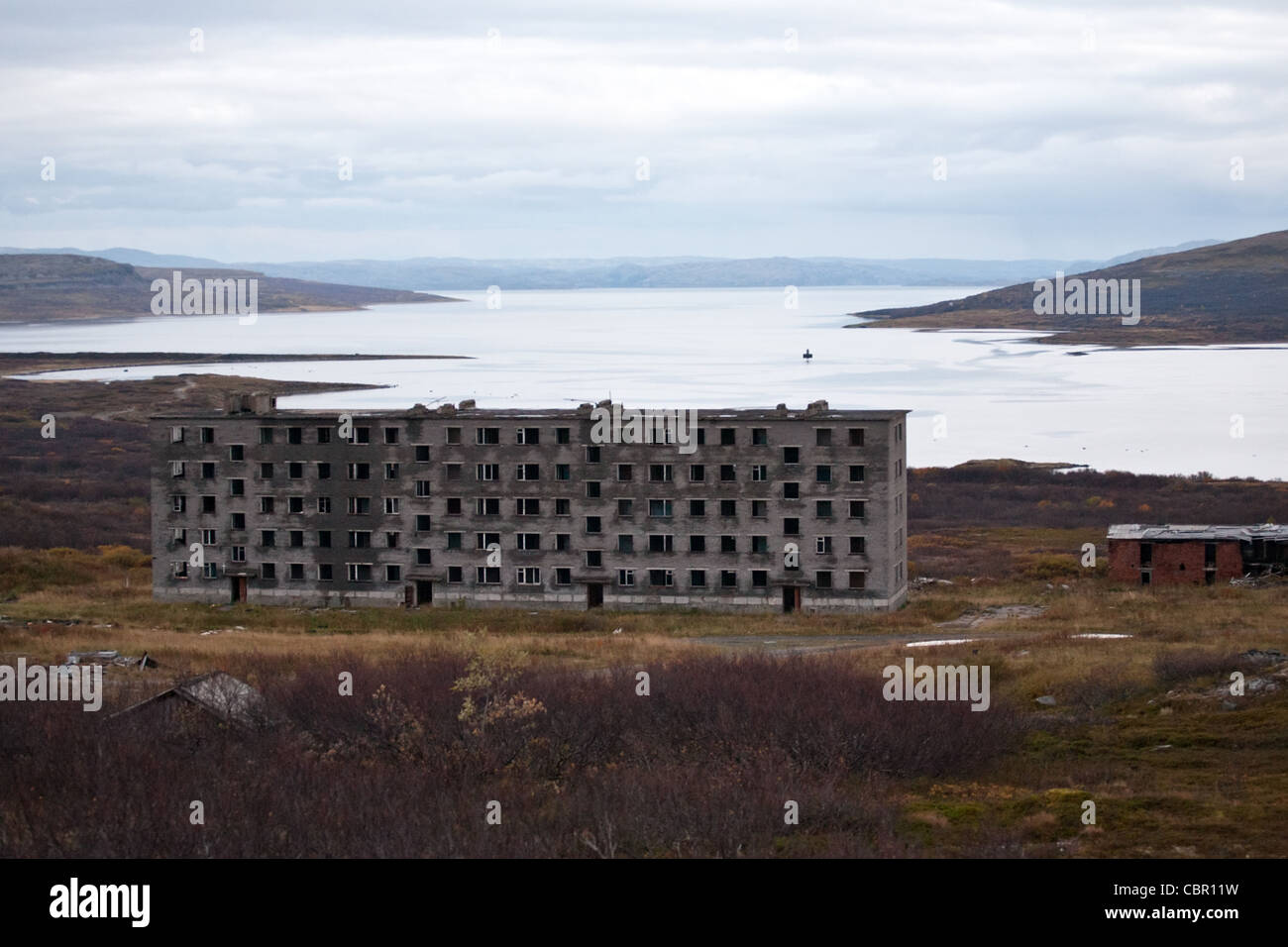 abandoned block of flats house in deserted soviet town on northern ...
