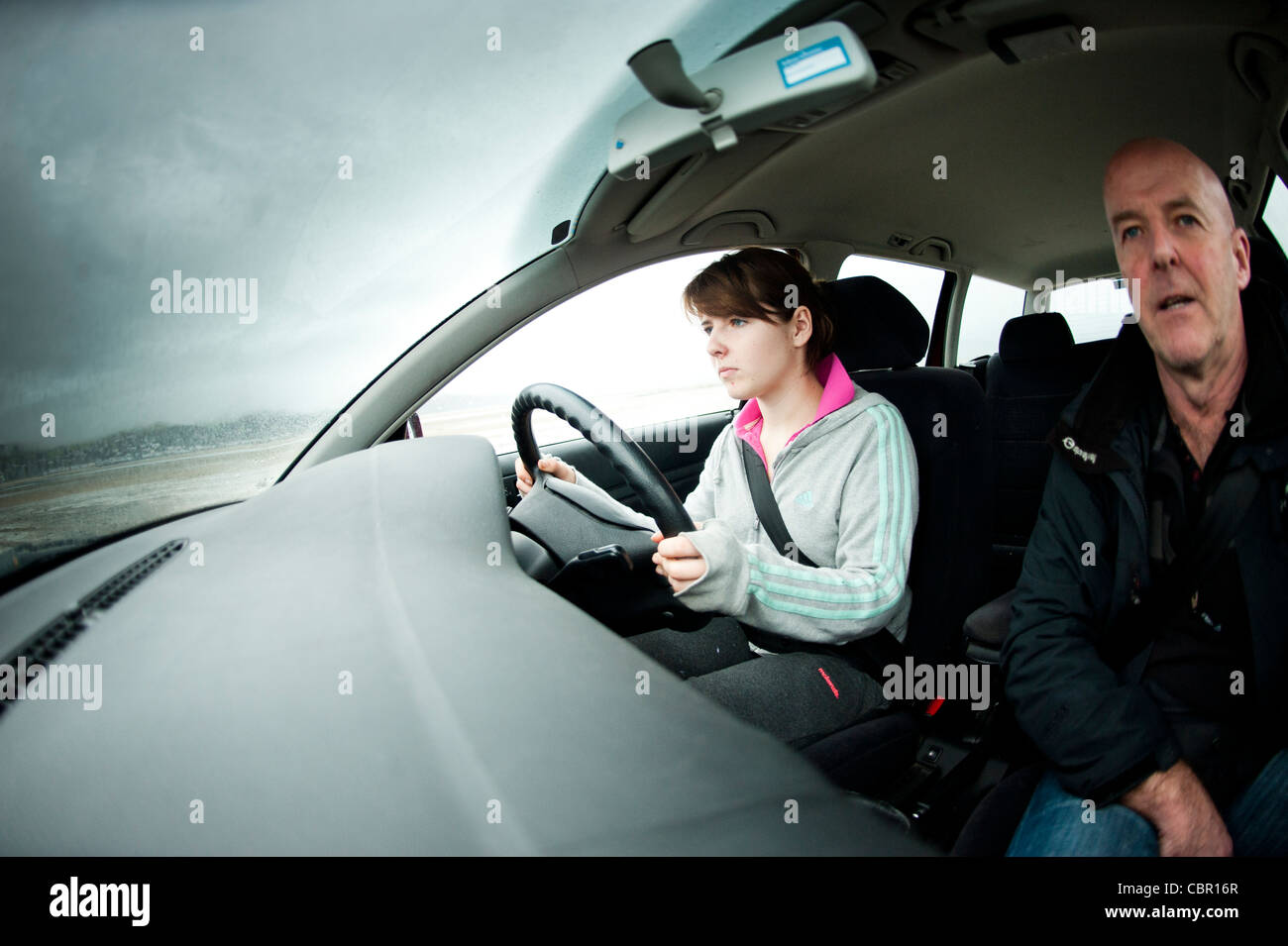 Father teaching daughter to drive High Resolution Stock Photography and ...