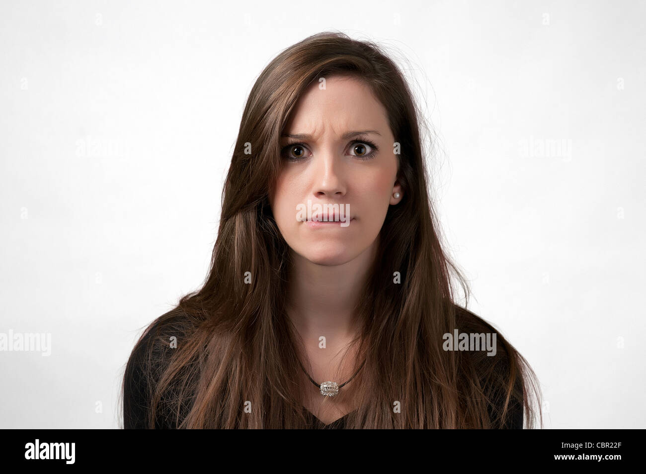 A YOUNG WOMAN SCARED Stock Photo - Alamy