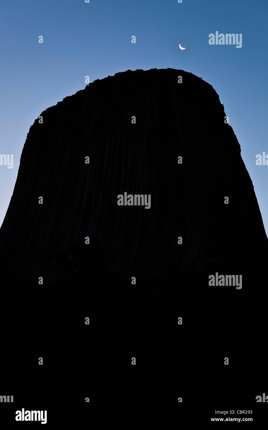 Moon setting just before dawn at Devil's Tower National Monument in ...