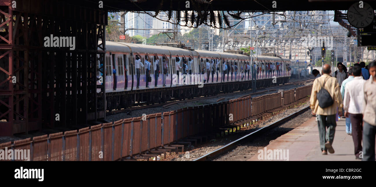 Office workers on crowded commuter train of Western Railway at ...