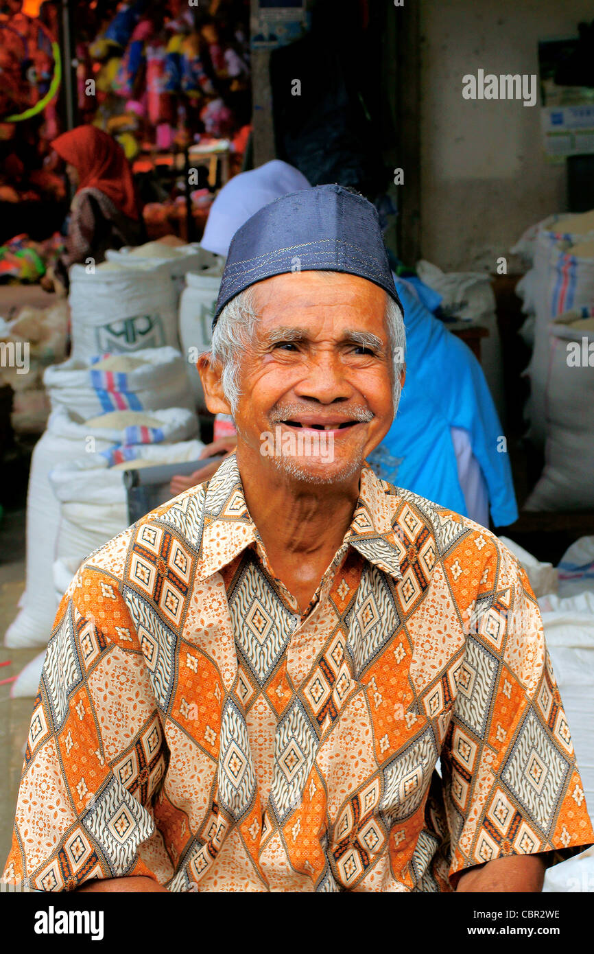 Indonesian man wearing fez in village of Sungaipenuh Indonesia on ...