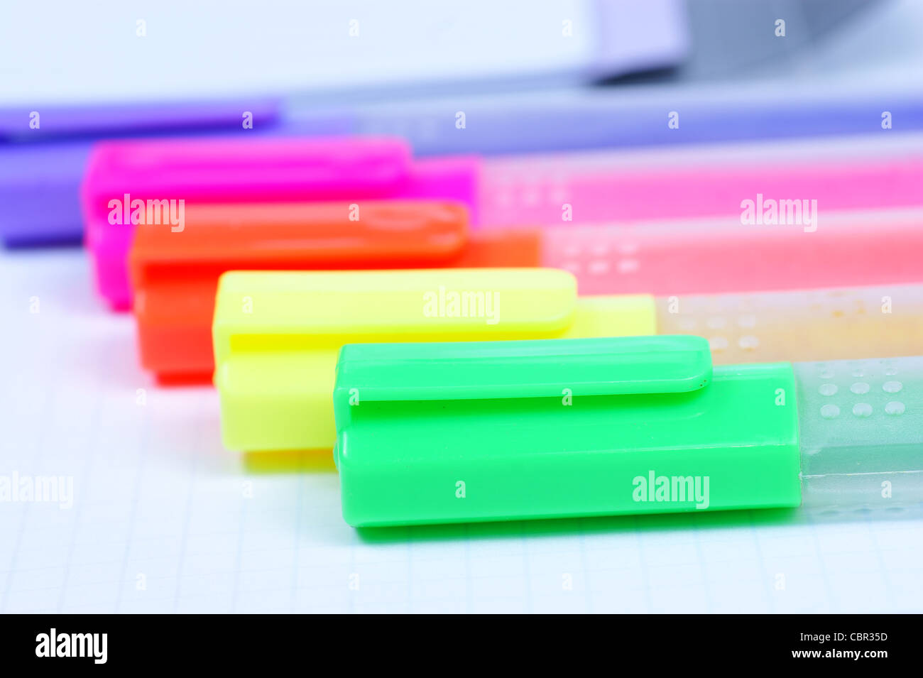 Colorful markers over a white background Stock Photo - Alamy