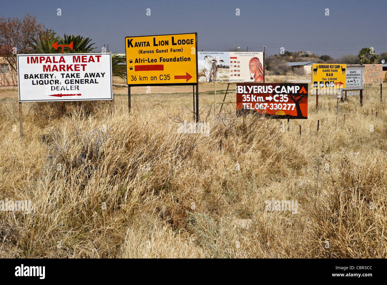 Advertising signs along highway in Namibia Stock Photo - Alamy