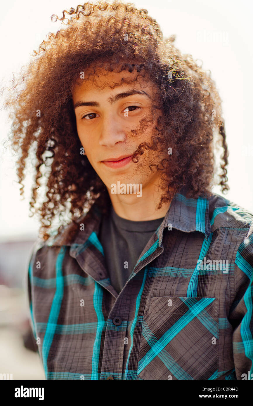 Smiling mixed race teenager Stock Photo - Alamy