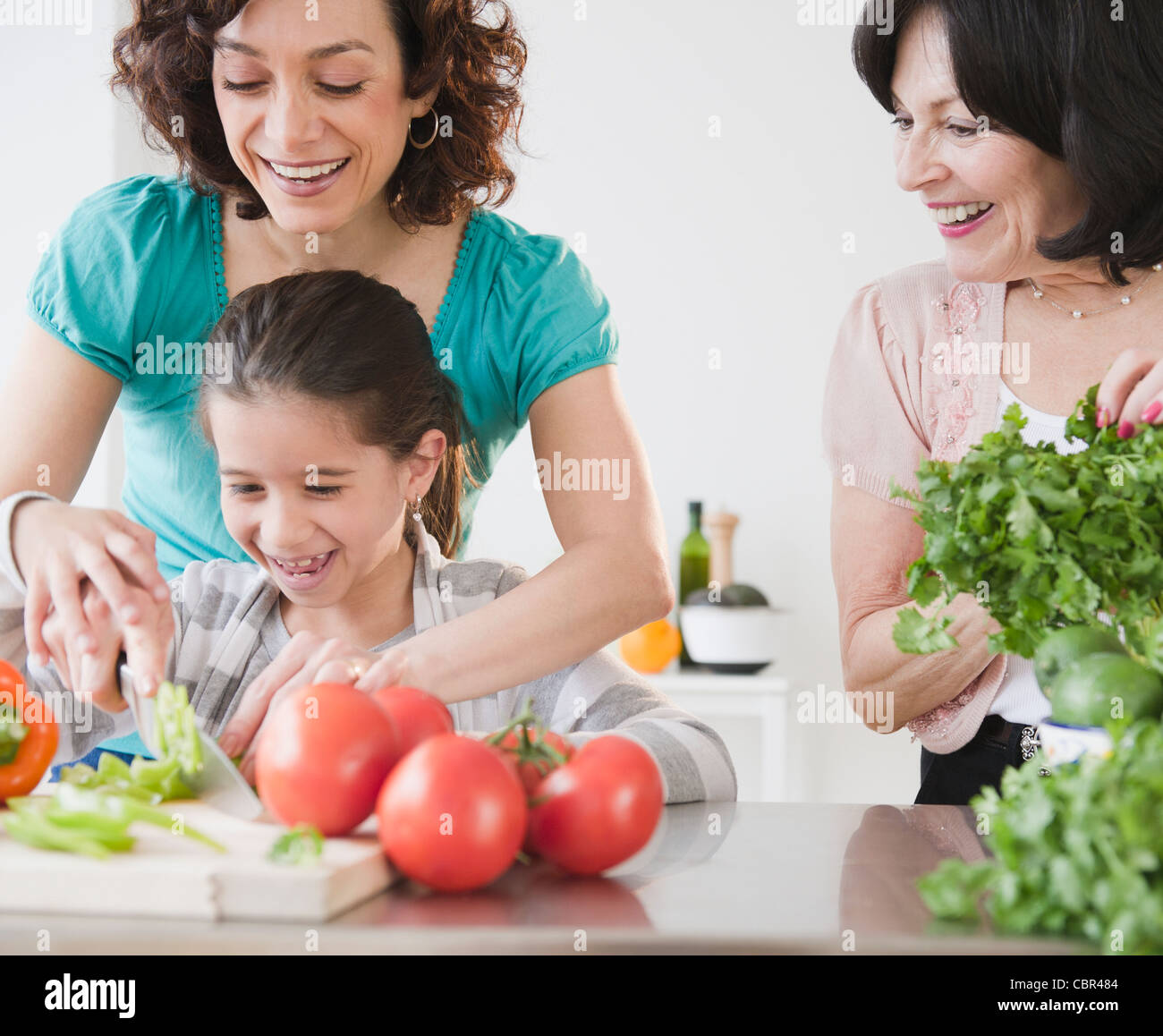 Family cooking together Stock Photo - Alamy