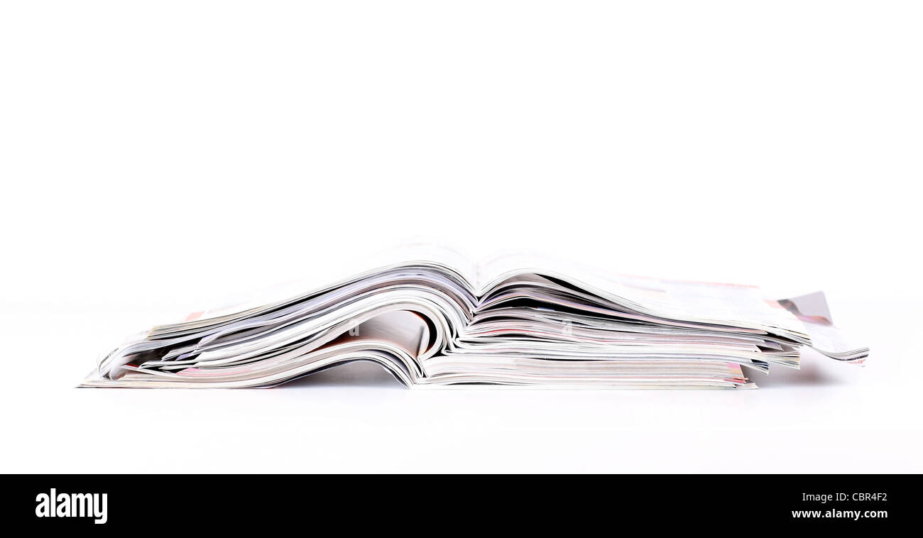 Batch of open magazines, close-up Stock Photo - Alamy