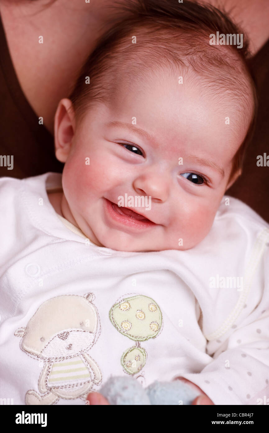 Cute baby girl laughing with toothless smile Stock Photo - Alamy