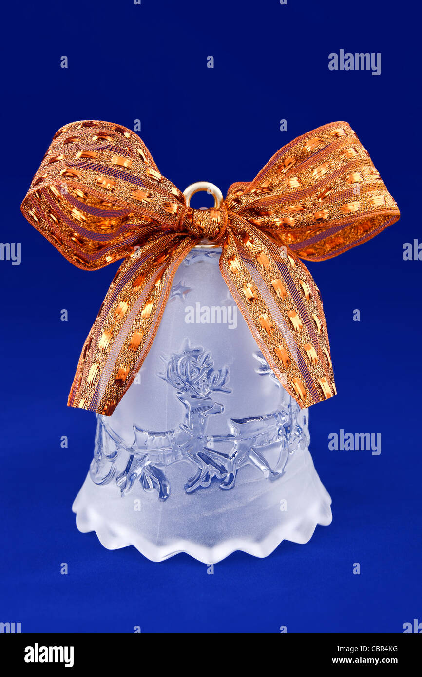 Glass Christmas bell with ribbon and reindeer Stock Photo - Alamy