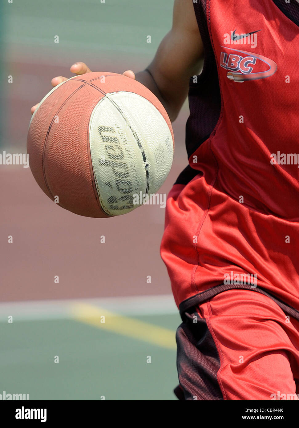 A cropped generic image of a basketball player Stock Photo - Alamy