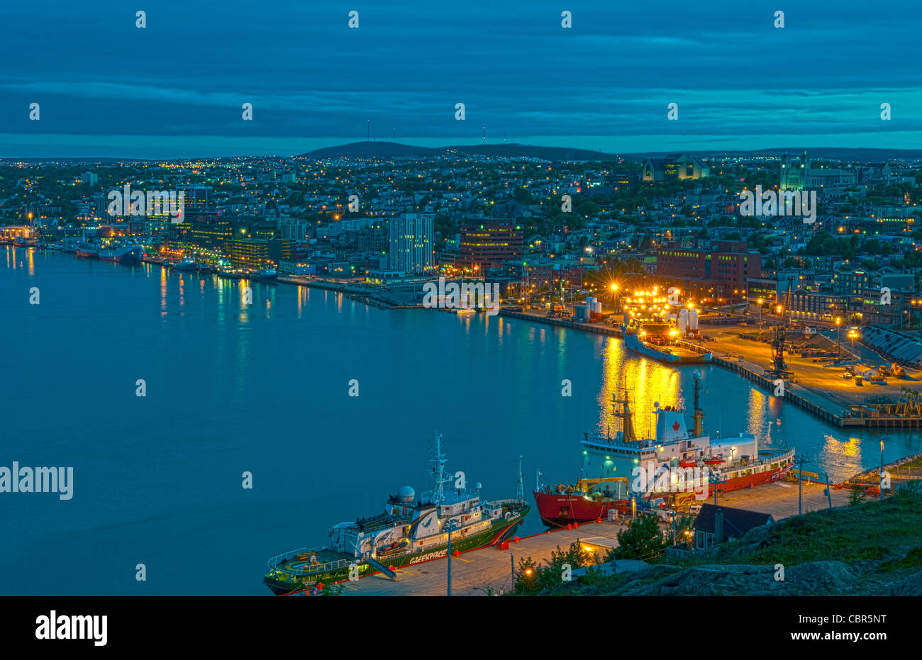 Newfoundland Canada St Johns capital at famous harbor at night time ...