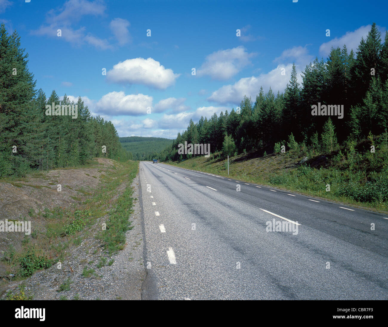 Driving through solitary road in hi-res stock photography and images ...