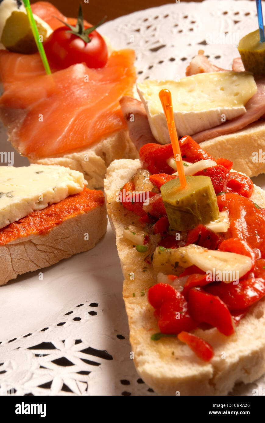 Assortment of colorful canapes for party Stock Photo - Alamy