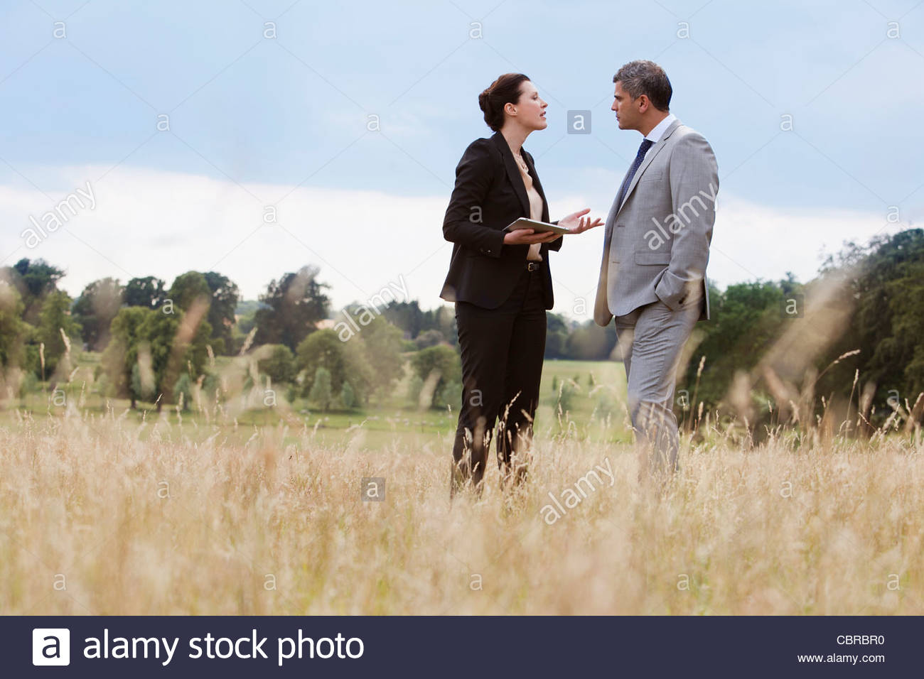 People Working Together Outside Stock Photos & People Working Together ...