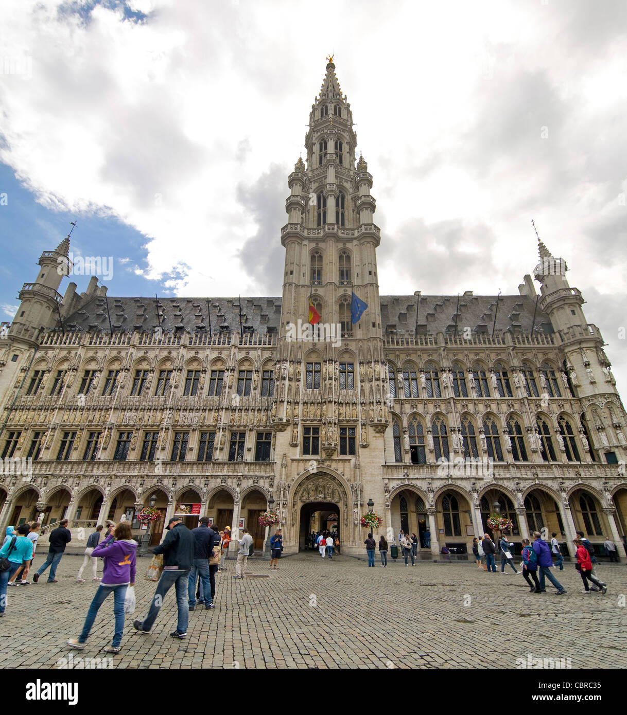 Square (2 picture-stitch) wide angle of the amazing Gothic architecture of Brussels Town Hall or ...