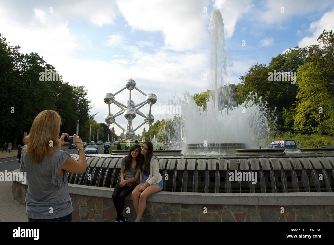 Horizontal view of the Atomium monument in Heysel Park with tourists ...