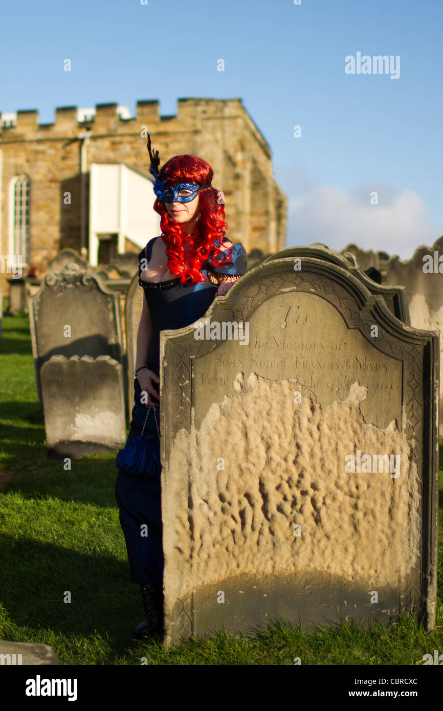 Lady in red mask hi-res stock photography and images - Alamy