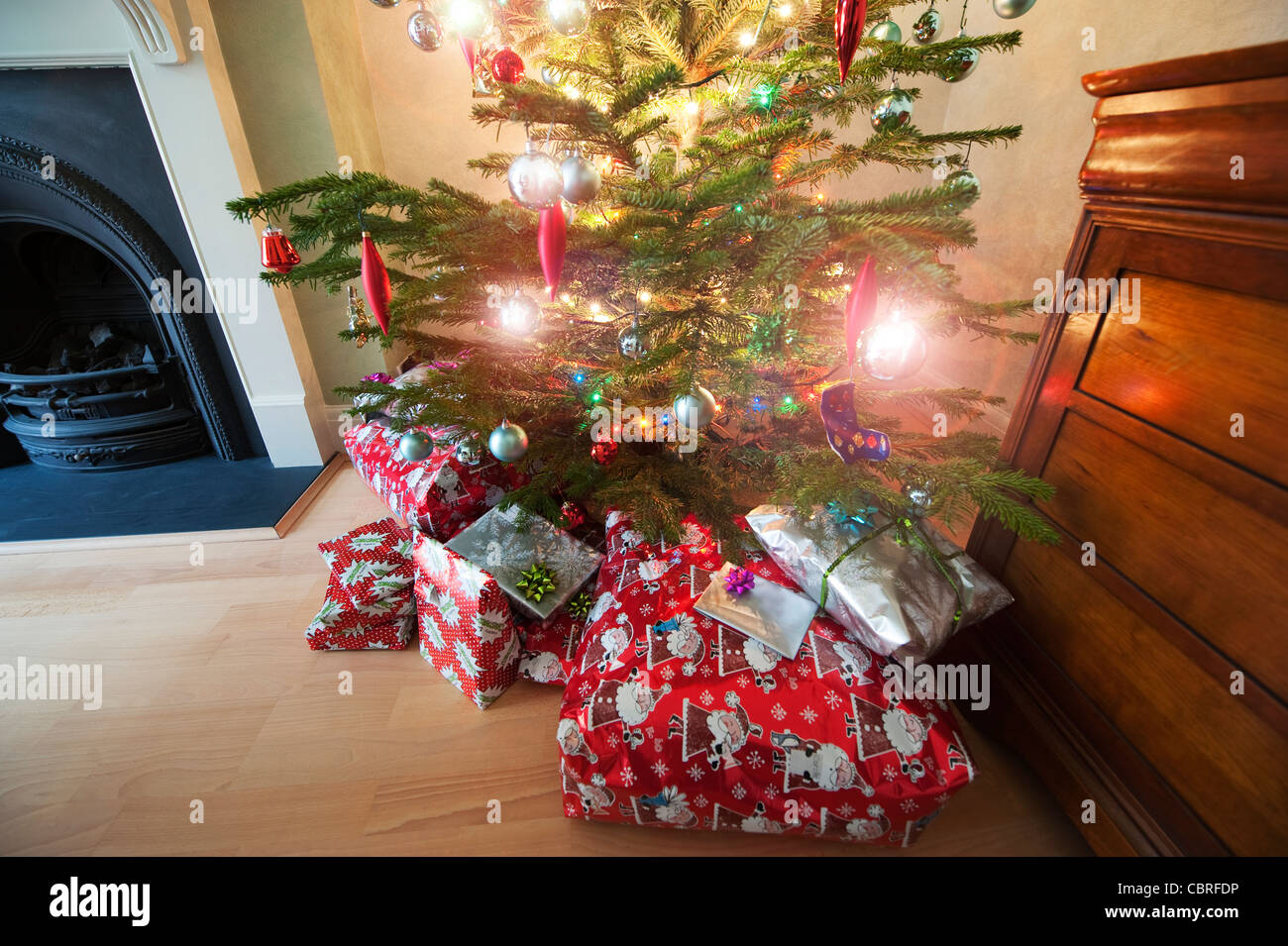 Presents under the Christmas Tree Stock Photo - Alamy