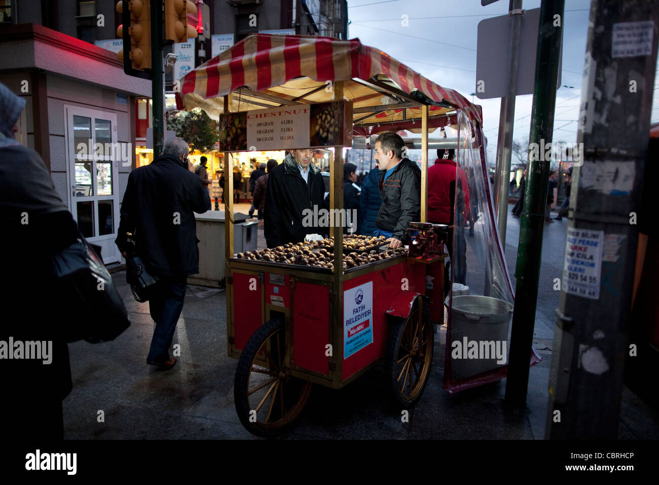 Street vendor selling roasted chestnuts hi-res stock photography and ...