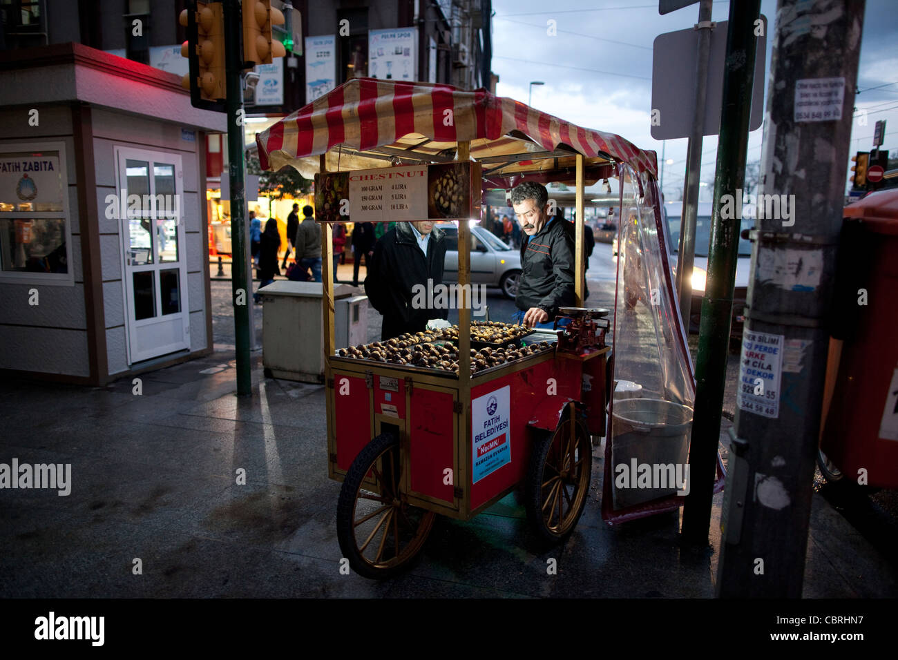Street vendor selling roasted chestnuts hi-res stock photography and ...