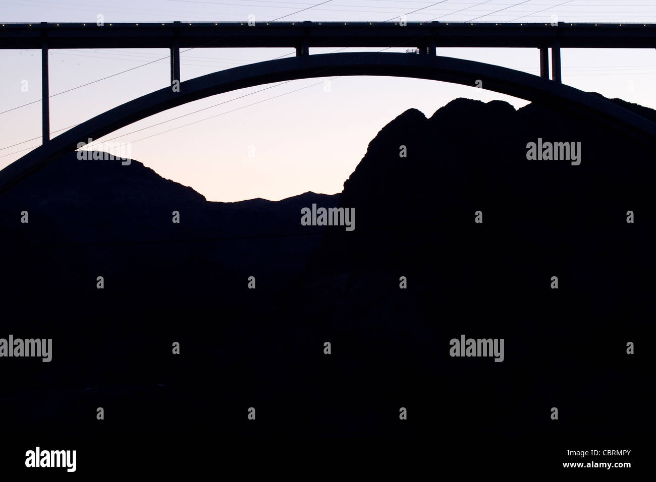 Silhouette of Hoover Dam Bridge and Mountains Stock Photo - Alamy