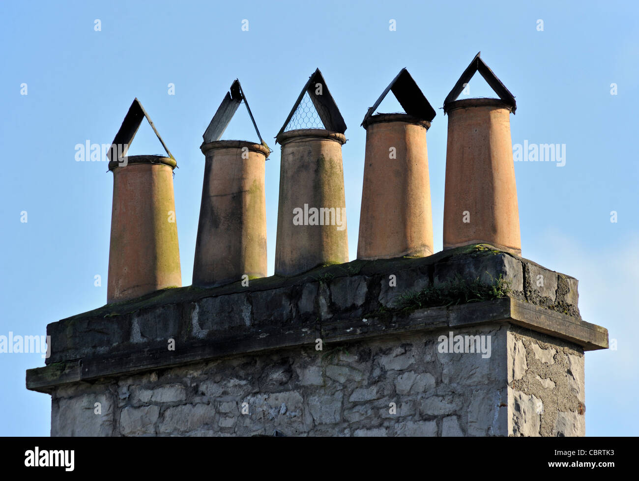 Chimney stack with five pots. Lound Road, Kendal, Cumbria, England ...