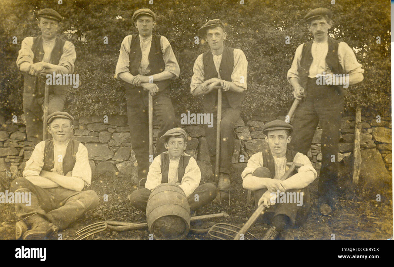 Postcard of farm workers Stock Photo - Alamy