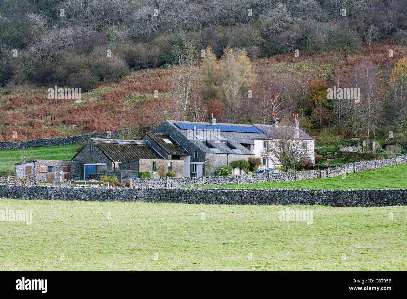 Farm and cottage with solar panels on the roof Austwick Yorkshire Dales ...