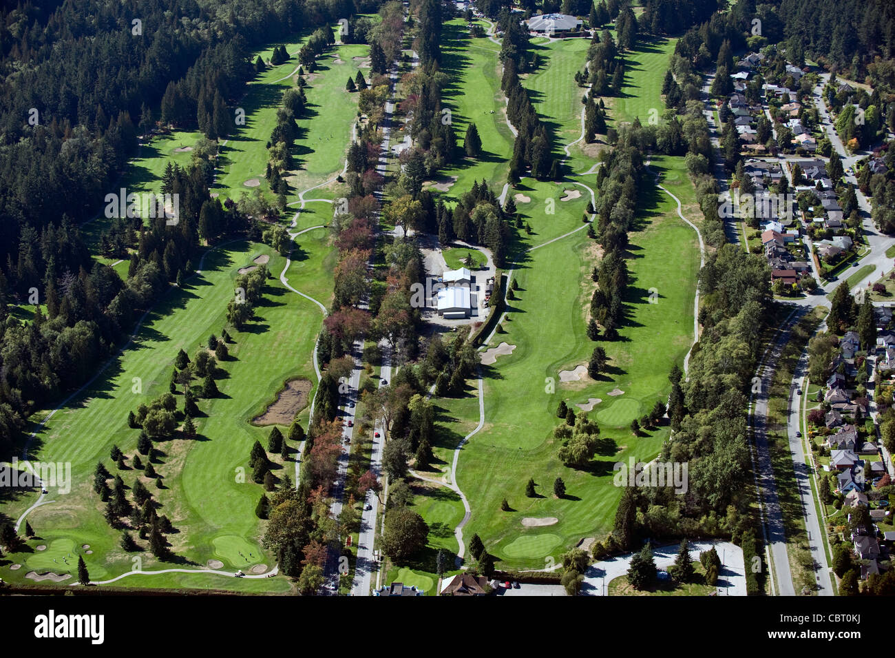 Green Golf Course between homes in Vancouver Stock Photo - Alamy