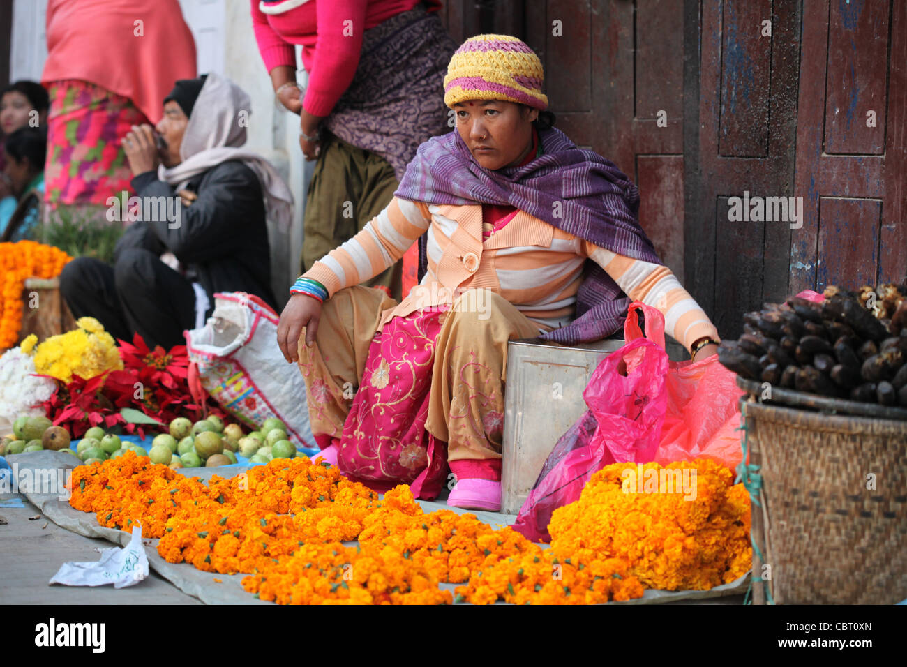 Marigold seller at Vegetable Market in Durbar Square, Kathmandhu Stock ...