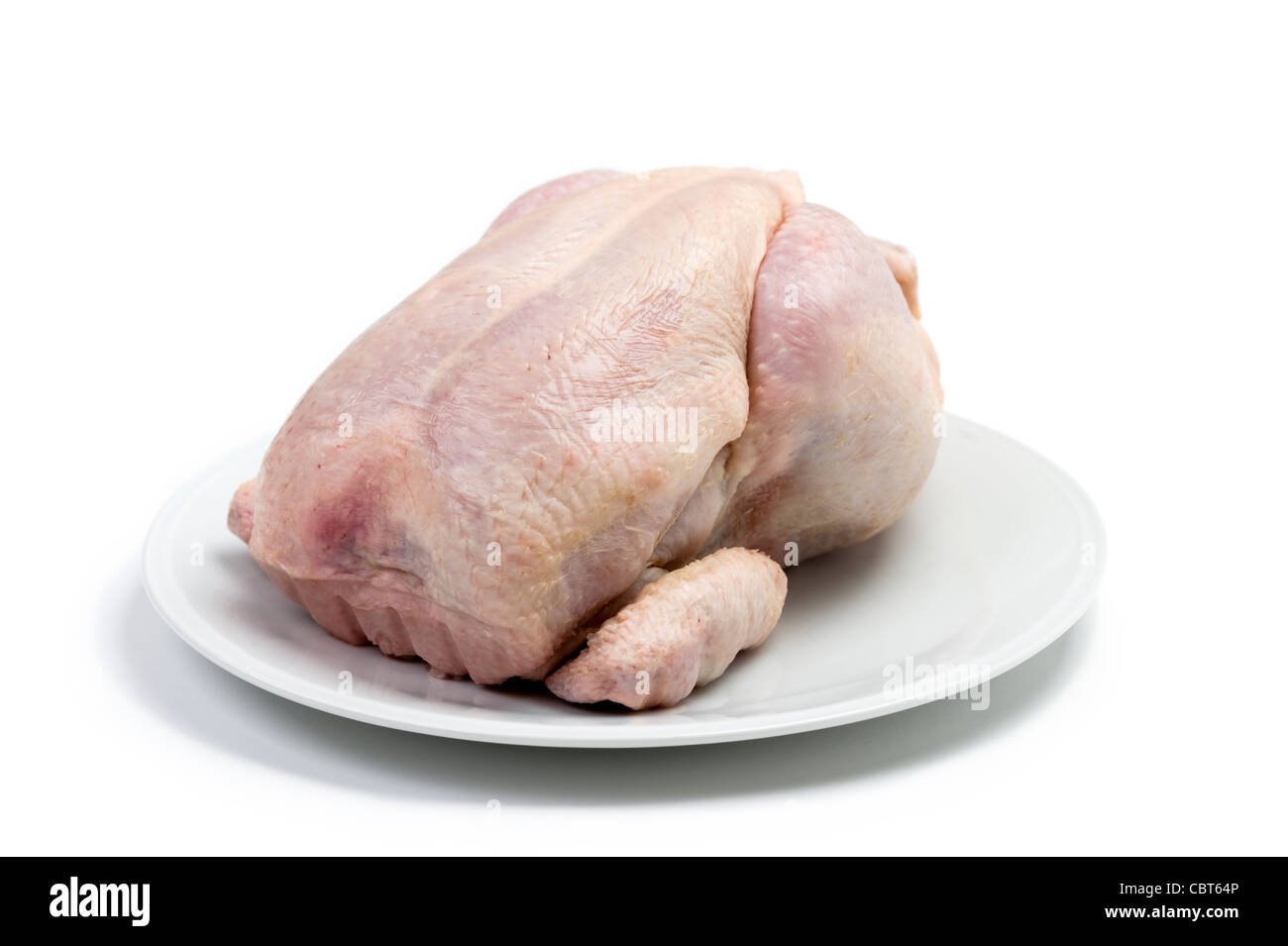 a raw whole chicken Stock Photo - Alamy