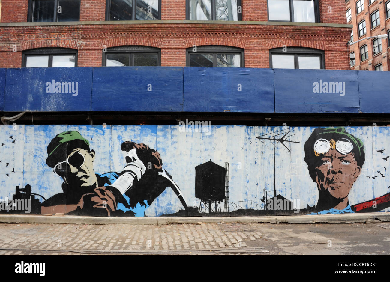 Artist Chris Stain's wall painting showing two workmen from Dumbo's ...