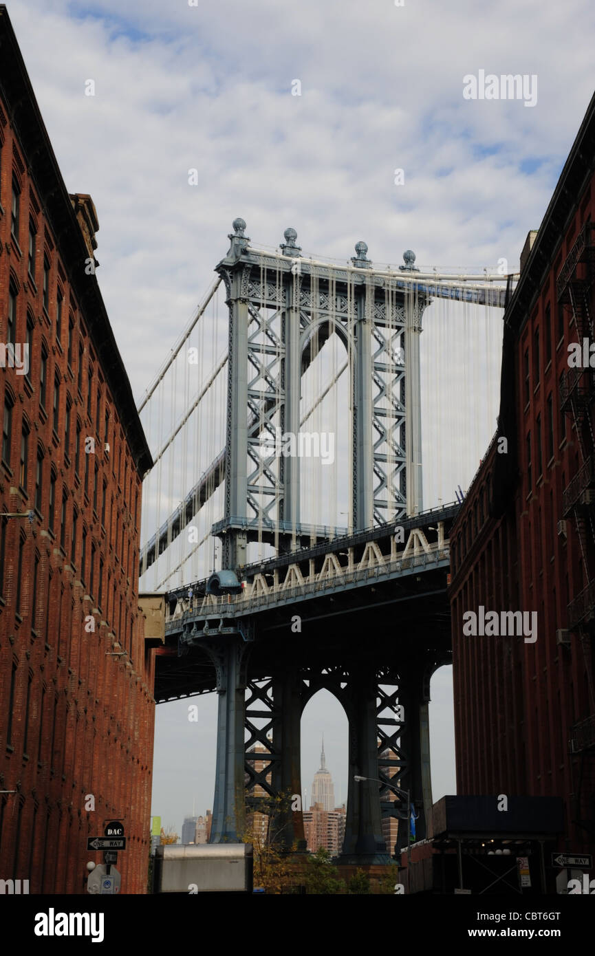 Portrait red brick buildings, Empire State Building bottom arch ...