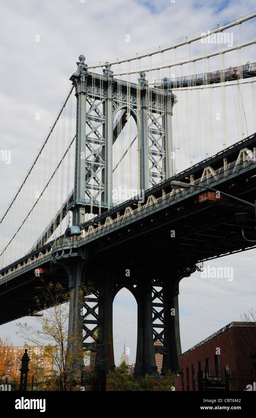 Autumn portrait Empire State Building through bottom arch Manhattan ...