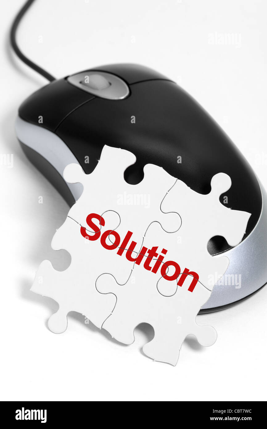 computer mouse and Puzzle, business concept of Solution Stock Photo - Alamy