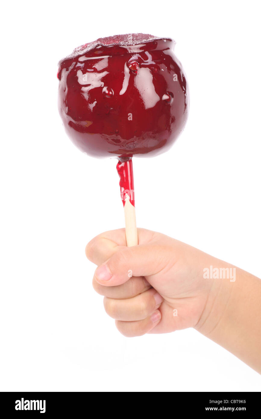 Red Taffy Apple with white background Stock Photo - Alamy