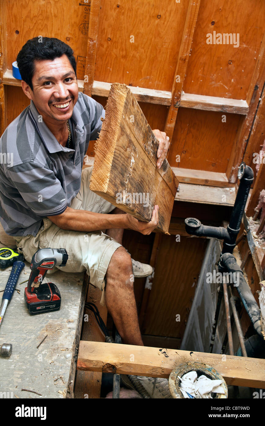 Portrait of Hispanic man from Mexico working his own construction ...