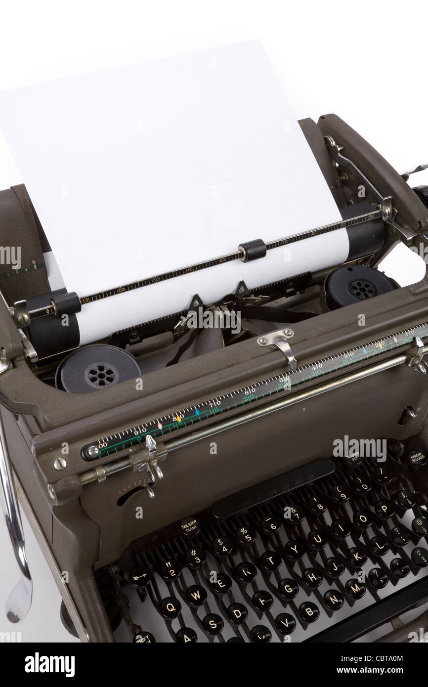 Typewriter and paper with white background Stock Photo - Alamy