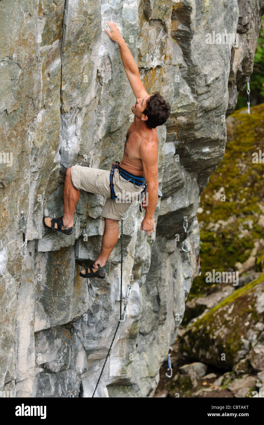 White male rock climbing Stock Photo - Alamy