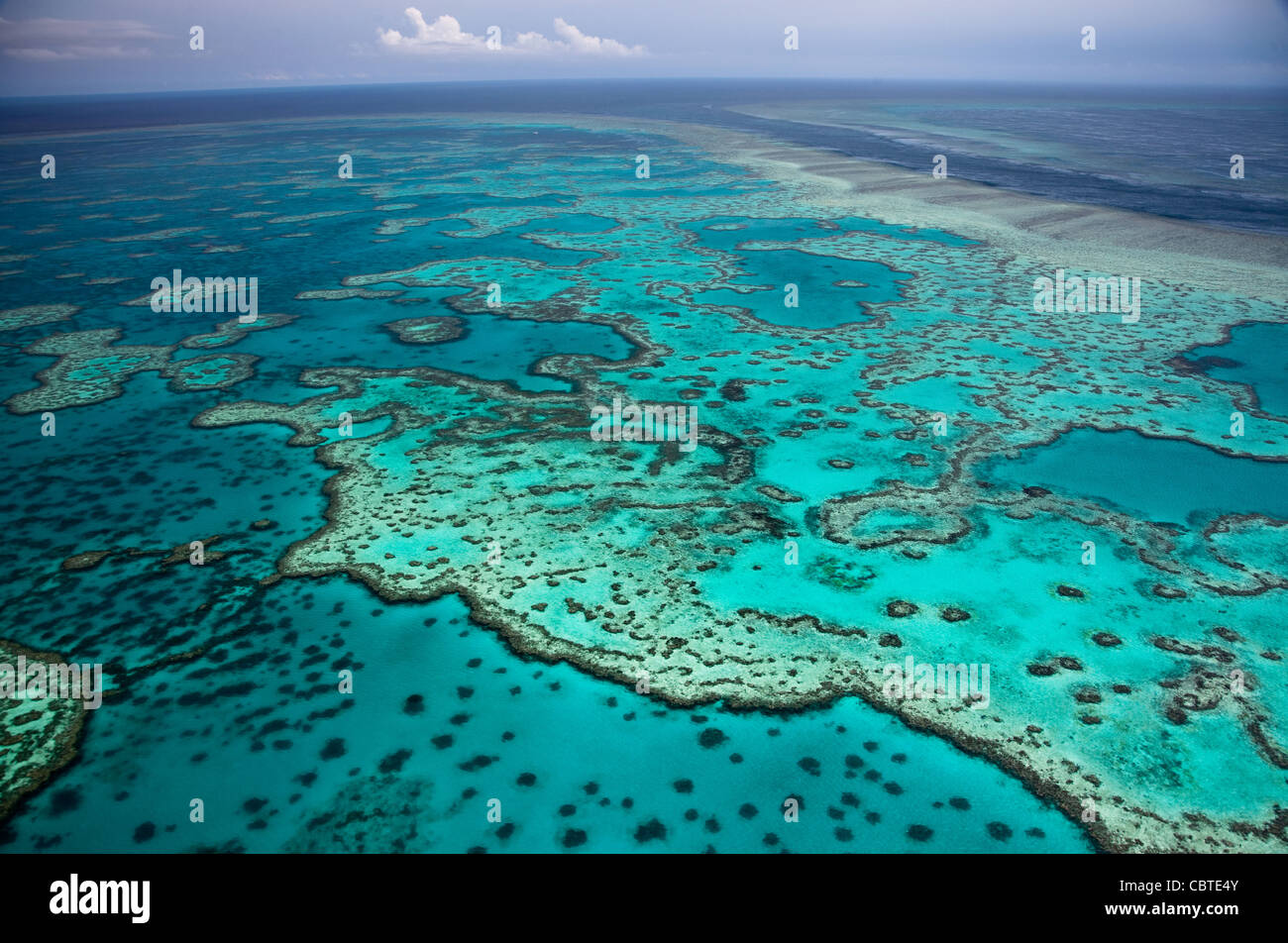 Aerial views of Hardy Reef and the channel of water known as the River ...
