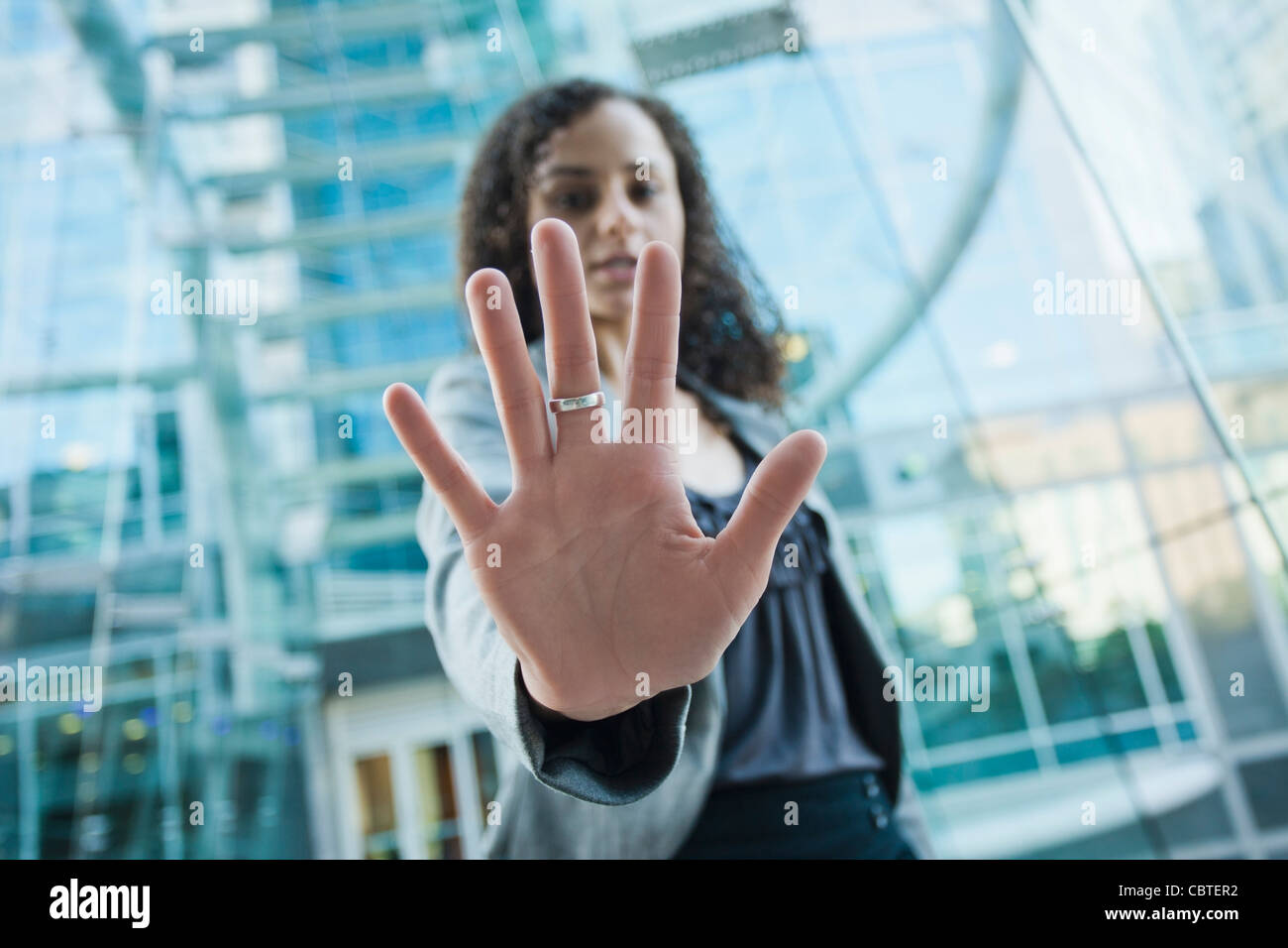 Hand blocking camera woman hi-res stock photography and images - Alamy
