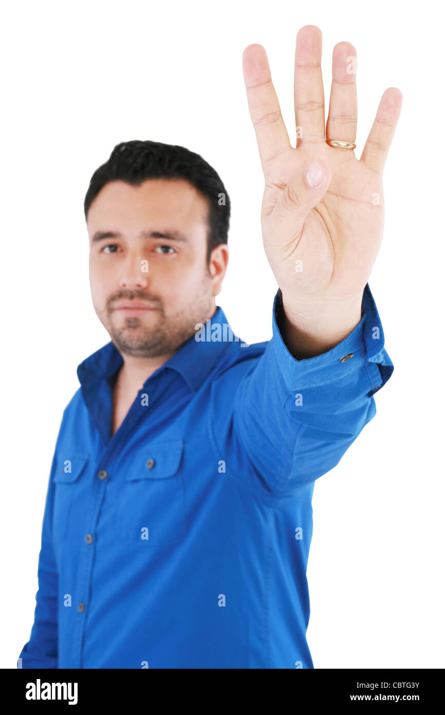 young good looking man with counting fingers against white background ...